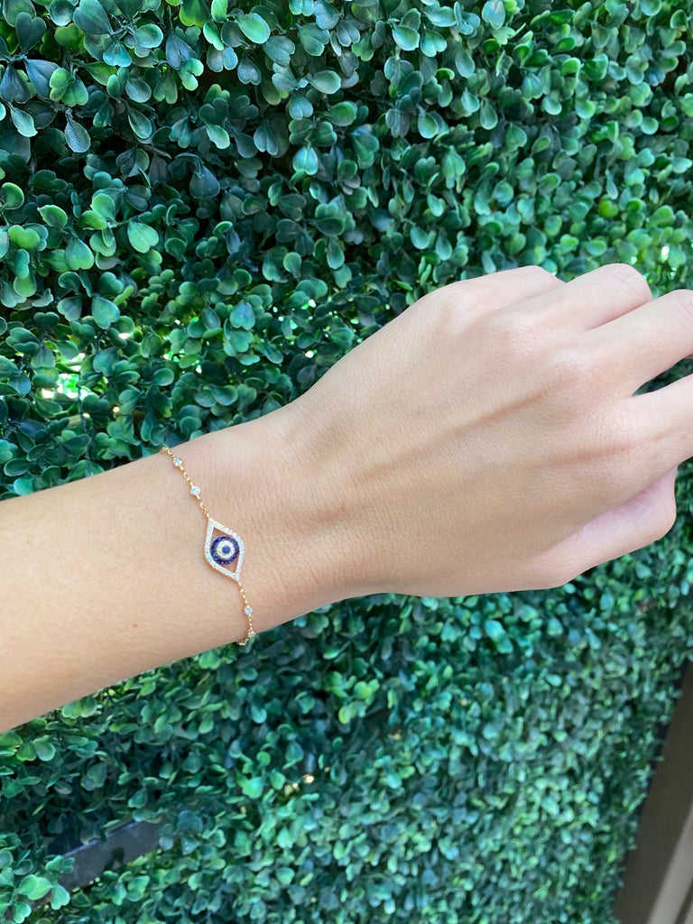 0.25ctq Diamond and 0.24ctw Sapphire Evil Eye 14 Karat Yellow Gold Bracelet For Sale at 1stDibs