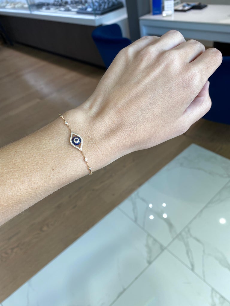 0.25ctq Diamond and 0.24ctw Sapphire Evil Eye 14 Karat Yellow Gold Bracelet For Sale at 1stDibs