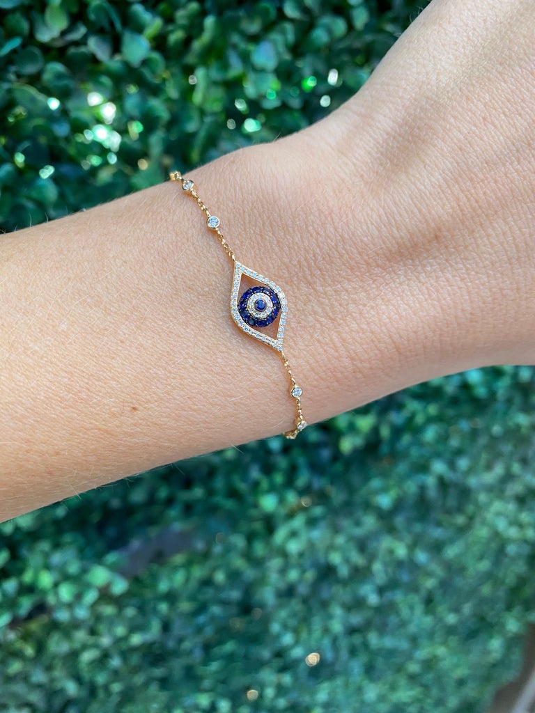 0.25ctq Diamond and 0.24ctw Sapphire Evil Eye 14 Karat Yellow Gold Bracelet For Sale at 1stDibs