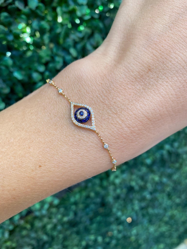 0.25ctq Diamond and 0.24ctw Sapphire Evil Eye 14 Karat Yellow Gold Bracelet For Sale at 1stDibs