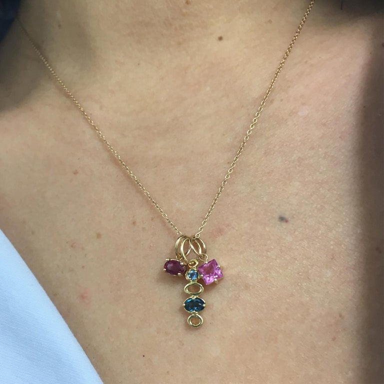 0.29 Carat Oval Ruby Stone Charm 14 Karat Gold For Sale at 1stDibs