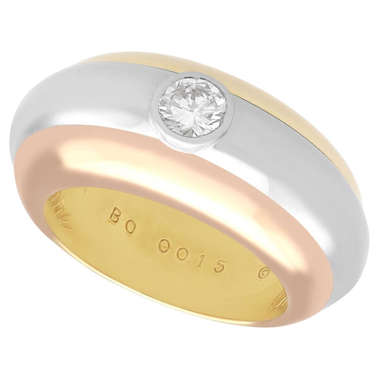 Cartier Bague solitaire en or tricolore 18 carats et diamant 0,54 carat ...