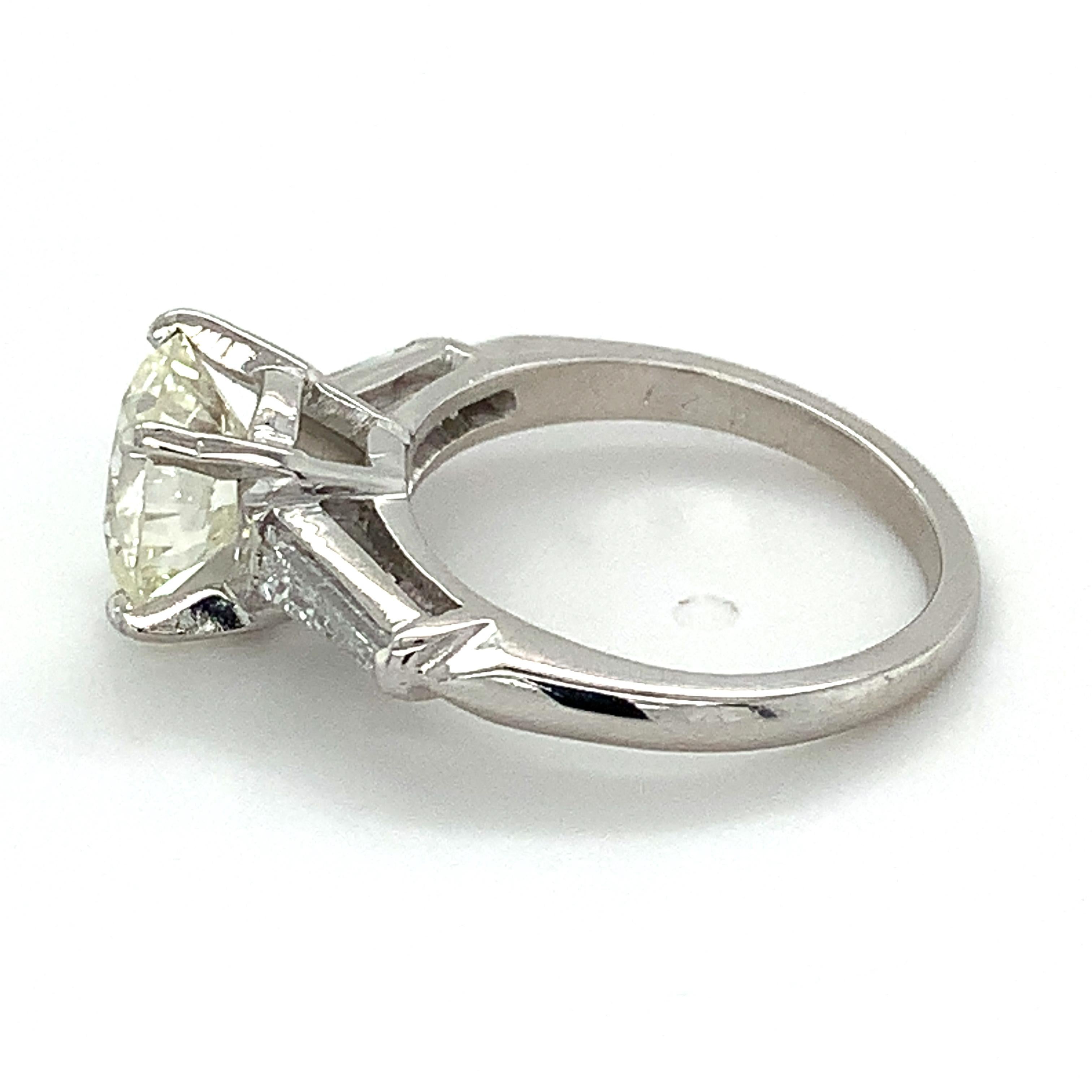 10% Irid 90% Plat GIA 2.12 L-VVS2 Round Diamond and Tapered Baguette 3 ...