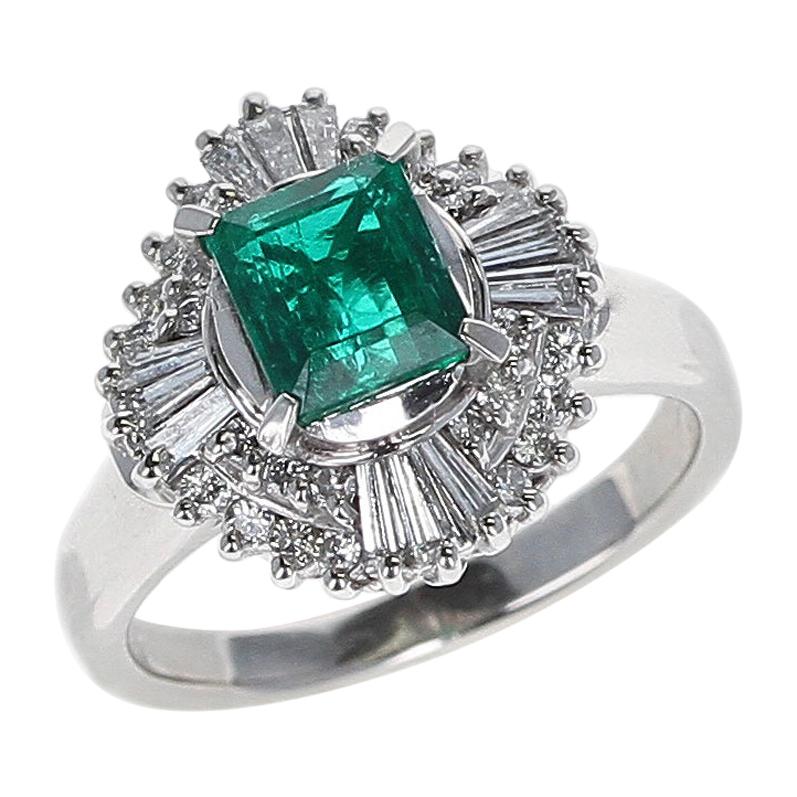 10.53 carat Emerald Cut Orange Sapphire with two Trapezoid Step Cut ...