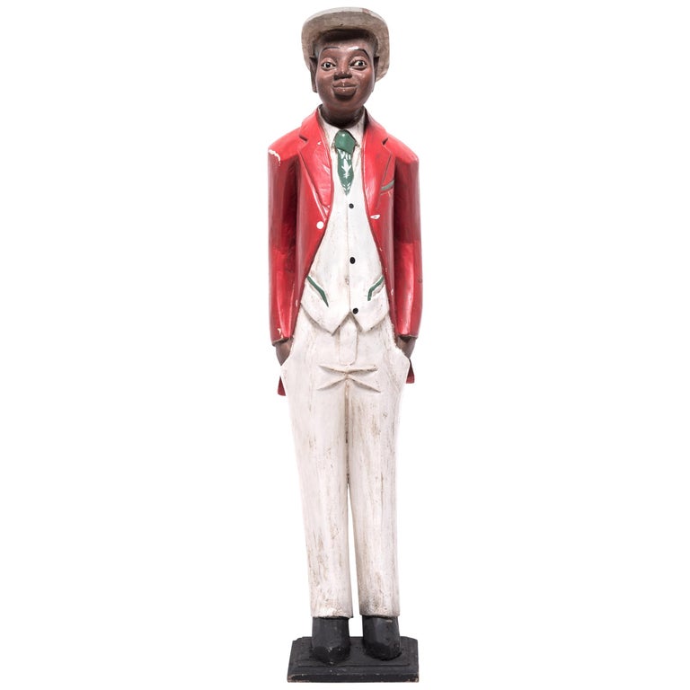 African Colonial Figure with Red Jacket at 1stDibs