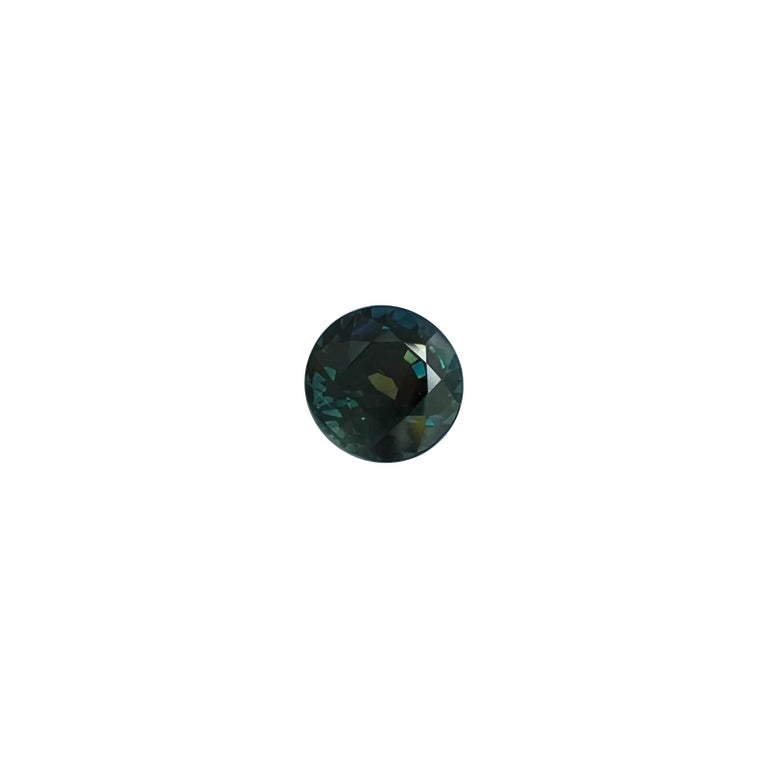 1.16ct Deep Orange Greenish Blue Sapphire Round Diamond Cut IGI ...