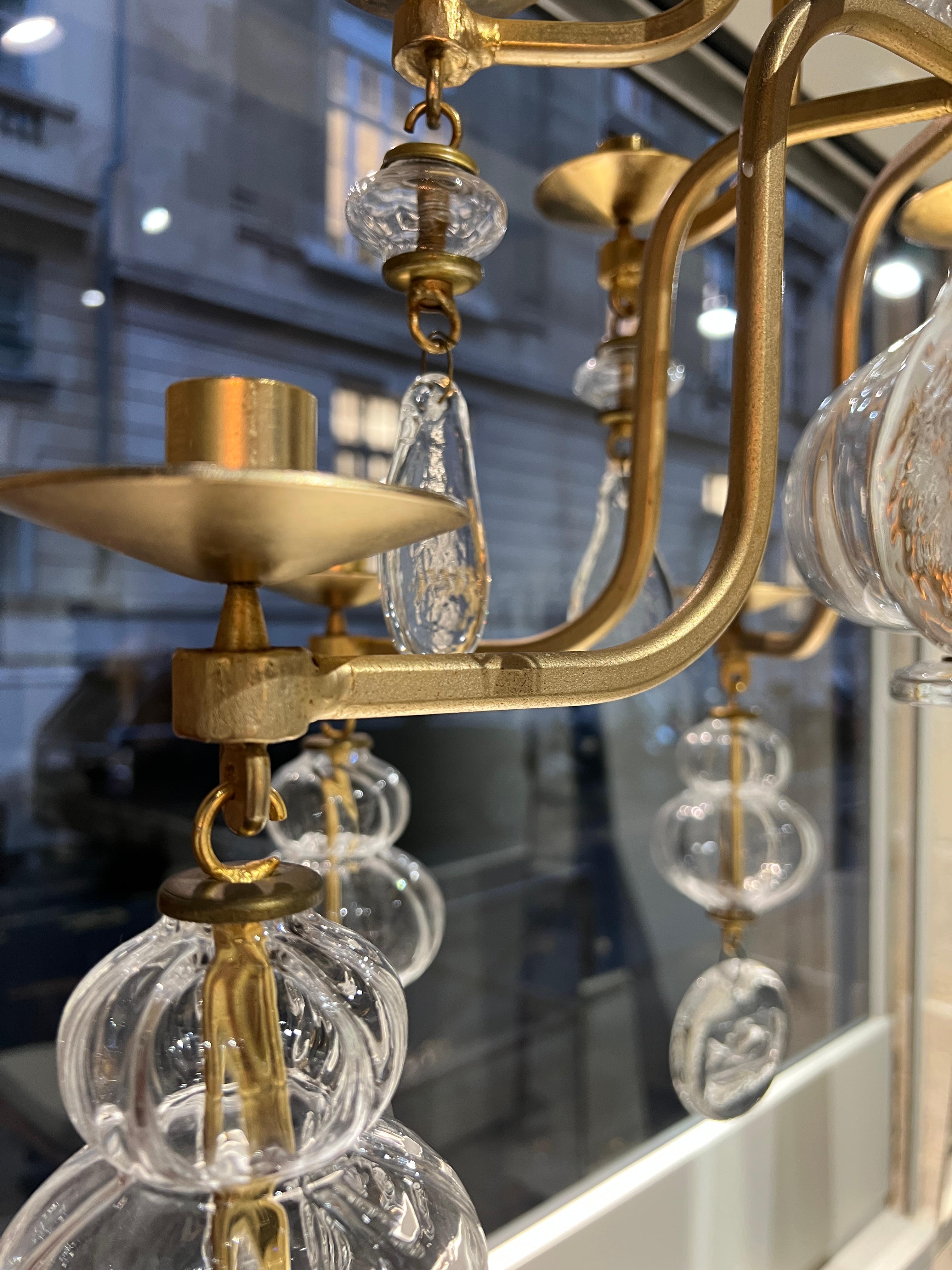 Erik Hoglund Sweden circa 1970 12 arms gold chandelier For Sale at 1stDibs