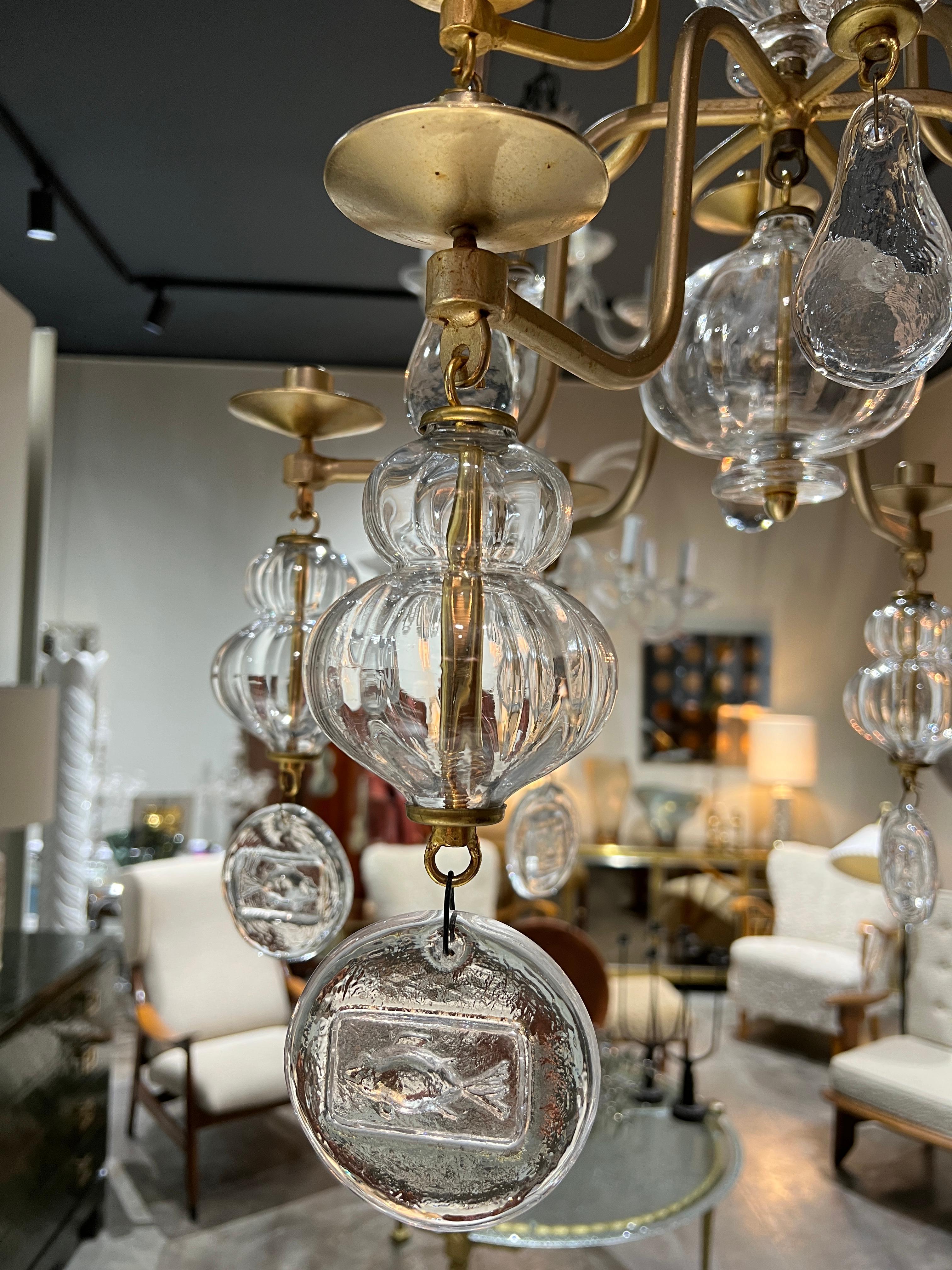 Erik Hoglund Sweden circa 1970 12 arms gold chandelier For Sale at 1stDibs