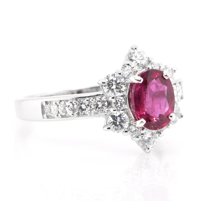 1.29 Carat Natural Ruby and Diamond Halo Ring Set in Platinum at 1stDibs