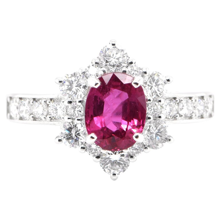 1.29 Carat Natural Ruby and Diamond Halo Ring Set in Platinum at 1stDibs
