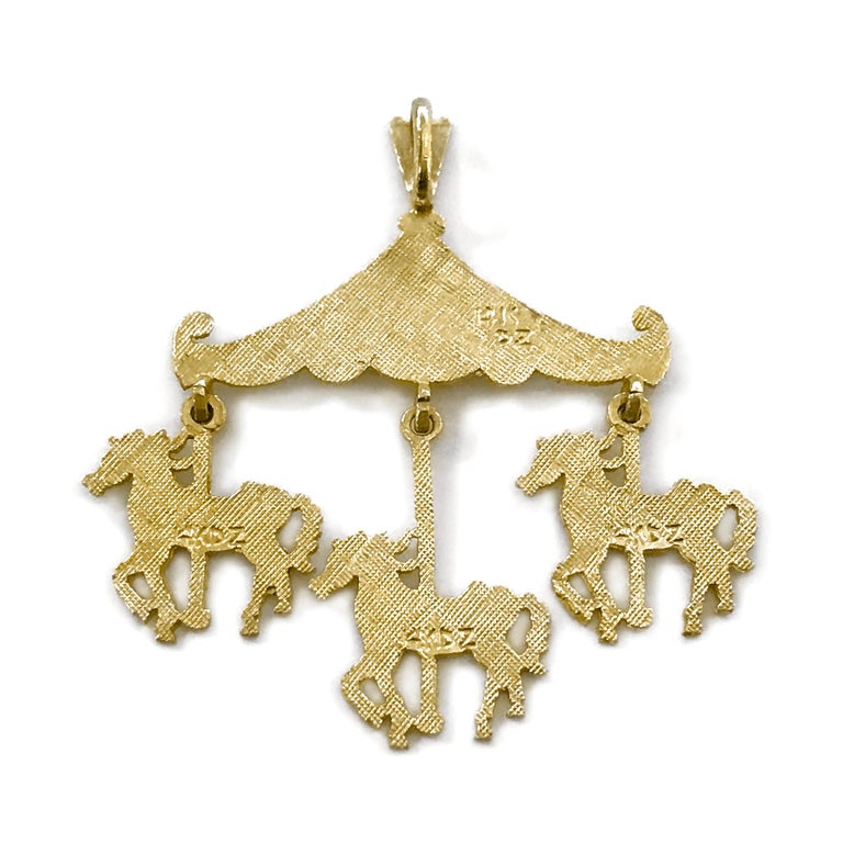 14 Karat Diamond Cut Carousel Pendant at 1stDibs