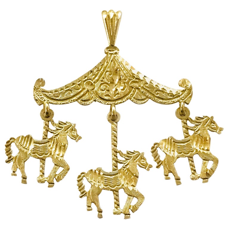 14 Karat Diamond Cut Carousel Pendant at 1stDibs