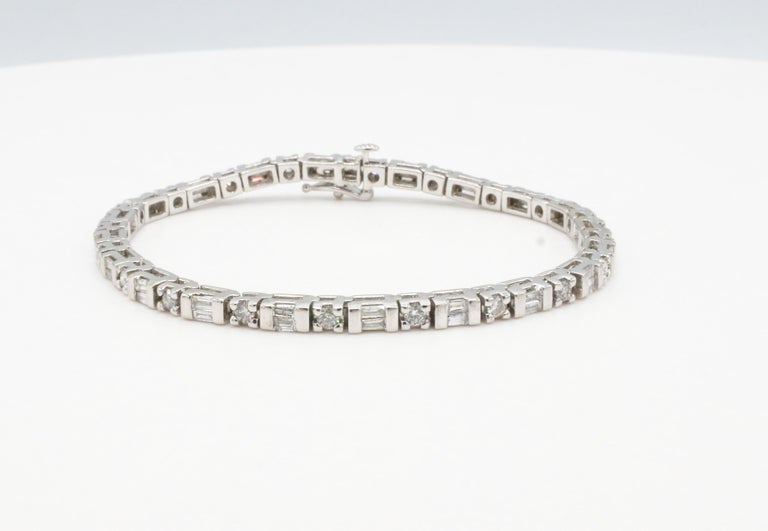 14 Karat White Gold 3 Carat Round and Baguette Diamond Tennis Line Bracelet For Sale at 1stDibs