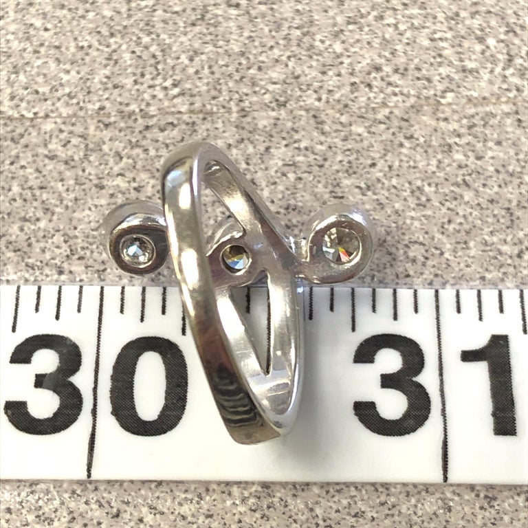 14 Karat White Gold 3 stone Diagonal Diamond ring For Sale at 1stDibs