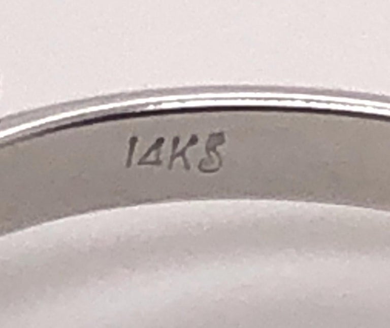 14 Karat White Gold Diamond Scimitar Ring For Sale at 1stDibs