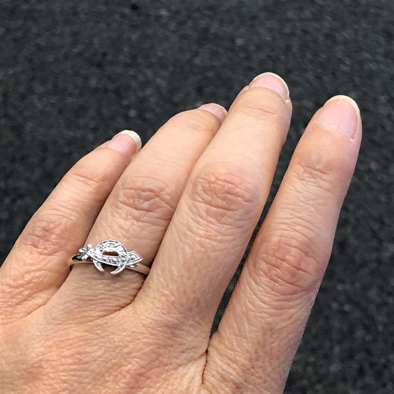 14 Karat White Gold Diamond Scimitar Ring For Sale at 1stDibs