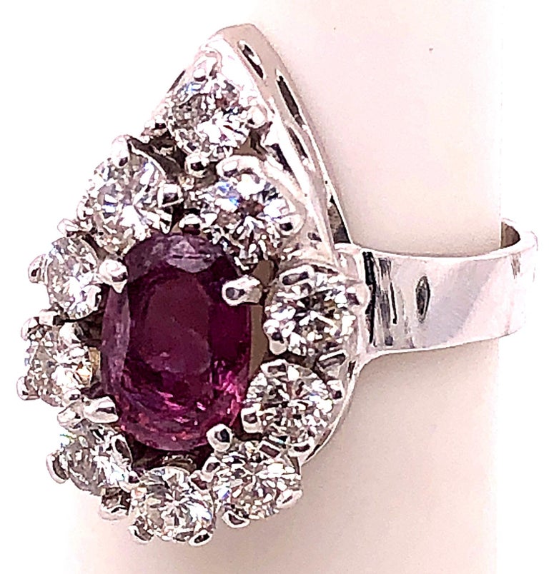 14 Karat White Gold Fashion Oval Ruby Solitaire Ring with Encircling ...
