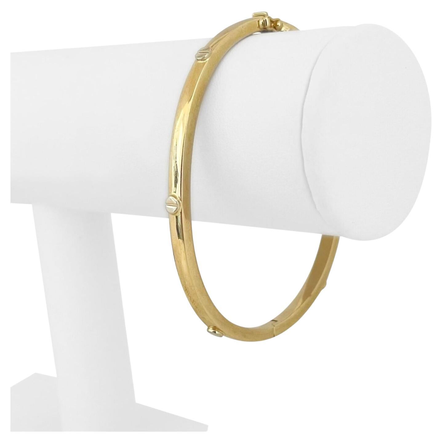 14 Karat Yellow Gold Hollow Screw Motif Bangle Bracelet For Sale at 1stDibs