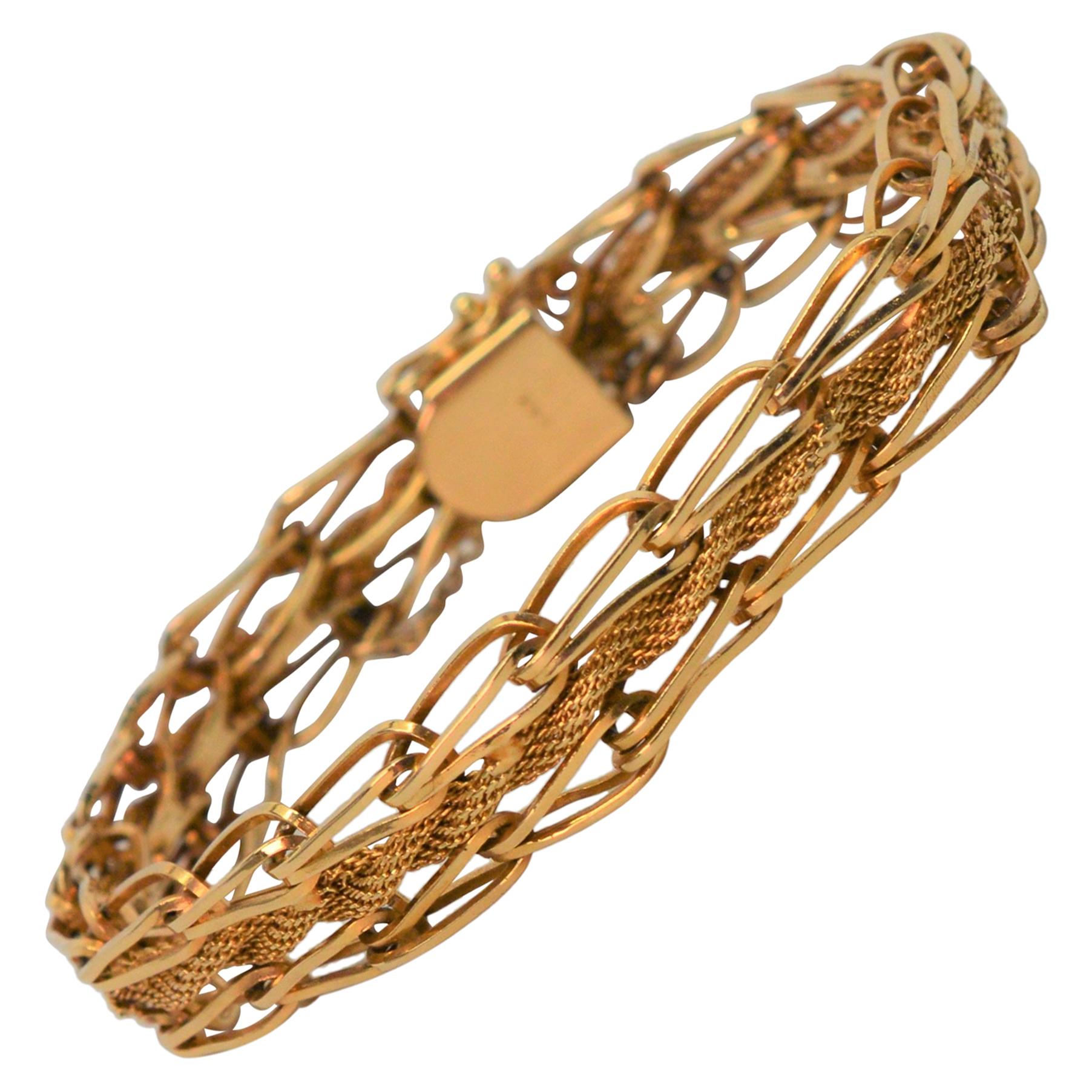 14 Karat Yellow Gold Intertwined Link Bracelet at 1stDibs