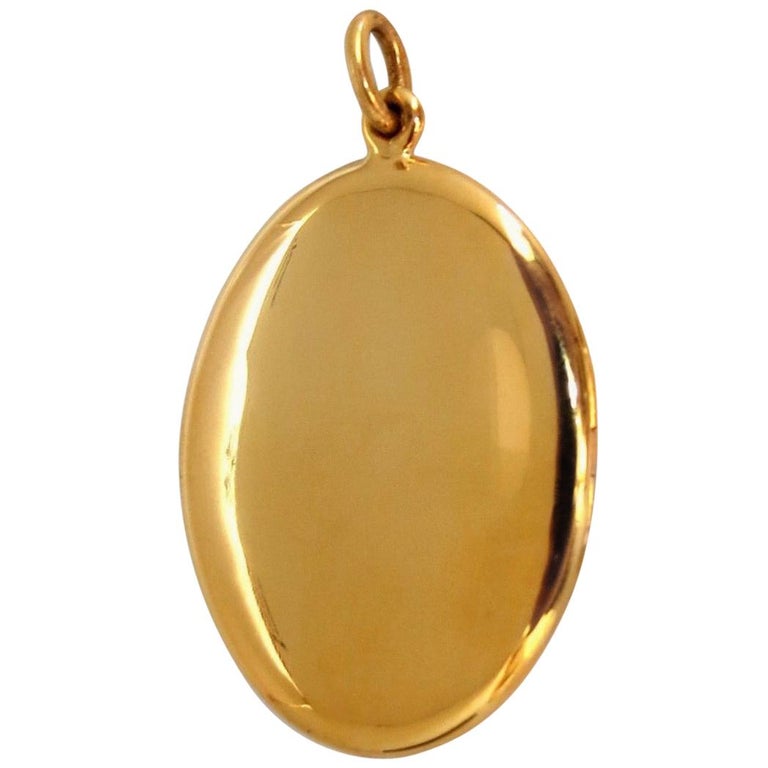 14 Karat Yellow Gold Locket at 1stDibs