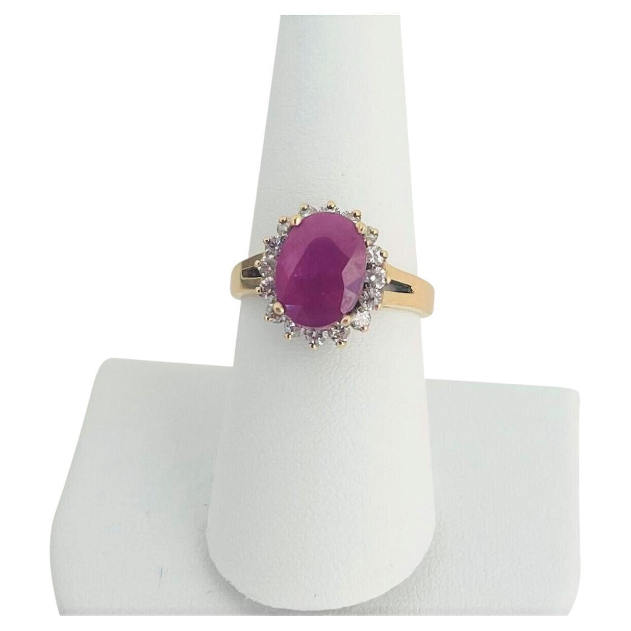 Estate Oval Ruby and Diamond Double Halo Ring For Sale at 1stDibs