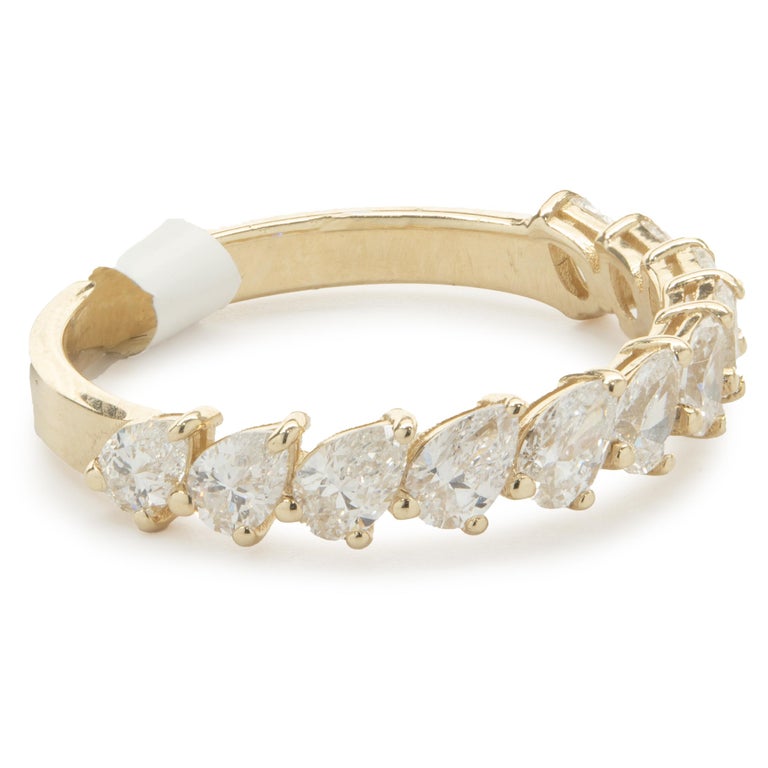 14 Karat Yellow Gold Pear Cut Diamond Tilt Band For Sale at 1stDibs