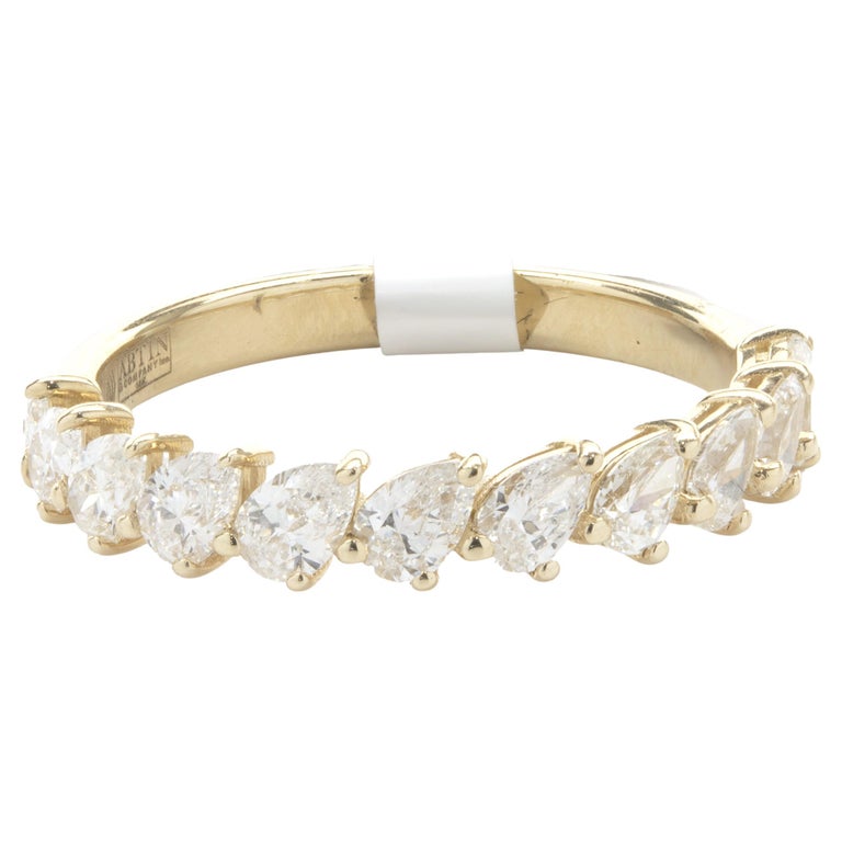14 Karat Yellow Gold Pear Cut Diamond Tilt Band For Sale at 1stDibs