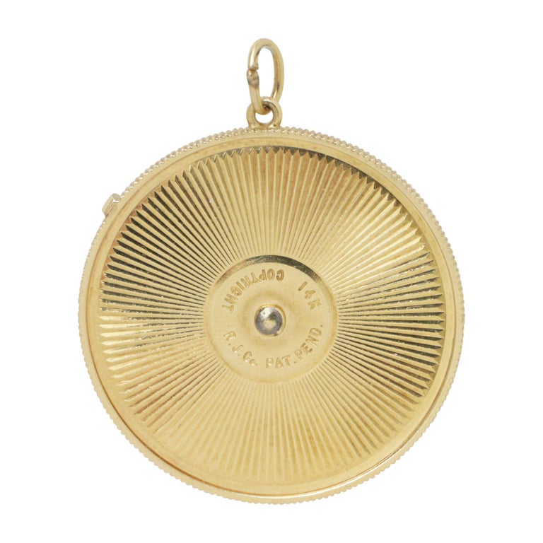 14 Karat Yellow Gold Retro Spinning Roulette Wheel Charm at 1stDibs