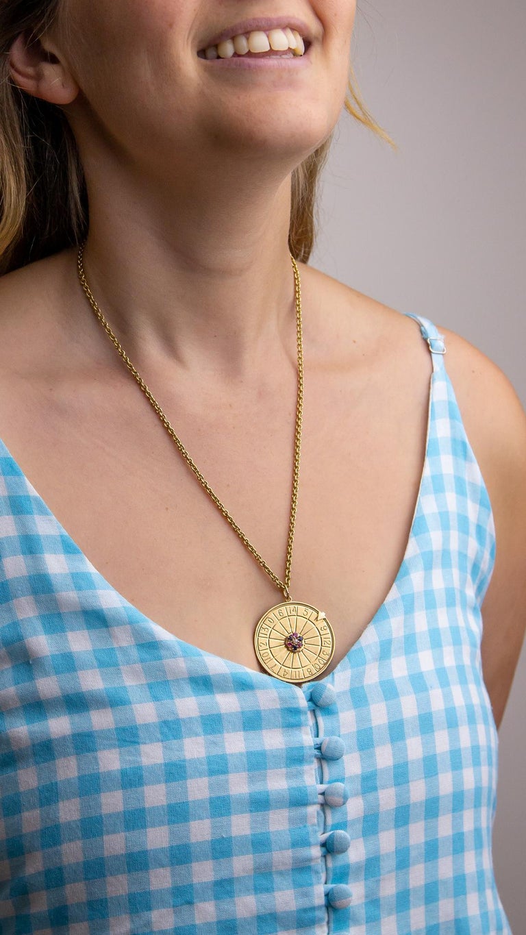14 Karat Yellow Gold Retro Spinning Roulette Wheel Charm at 1stDibs