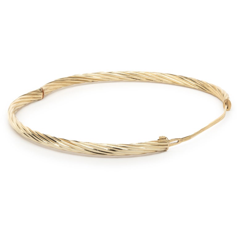 14 Karat Yellow Gold Twist Bangle Bracelet For Sale at 1stDibs