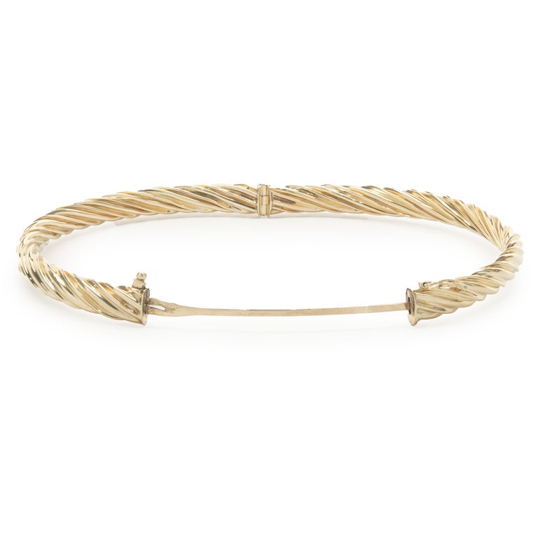 14 Karat Yellow Gold Twist Bangle Bracelet For Sale at 1stDibs