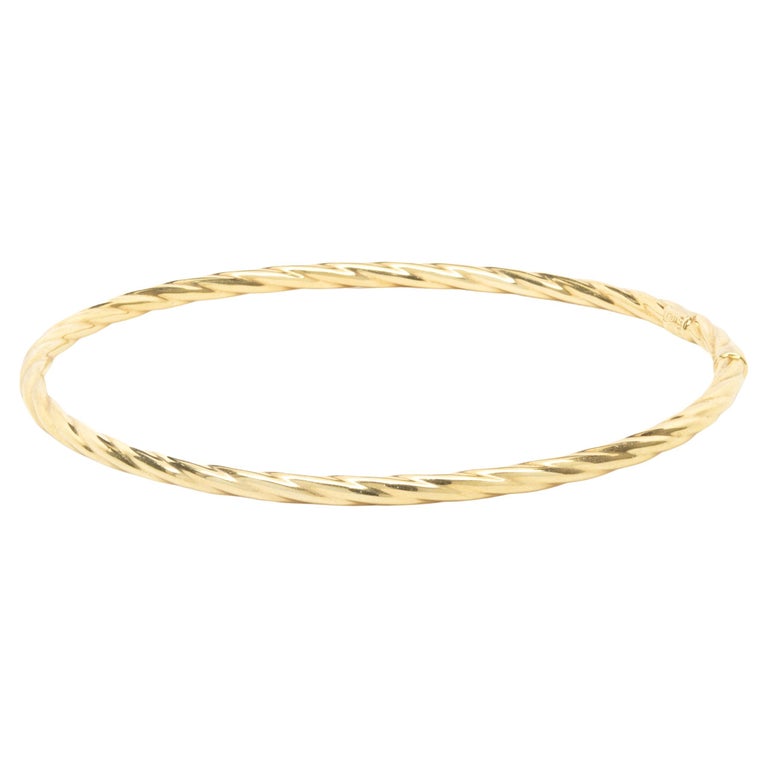 14 Karat Yellow Gold Twist Bangle Bracelet For Sale at 1stDibs