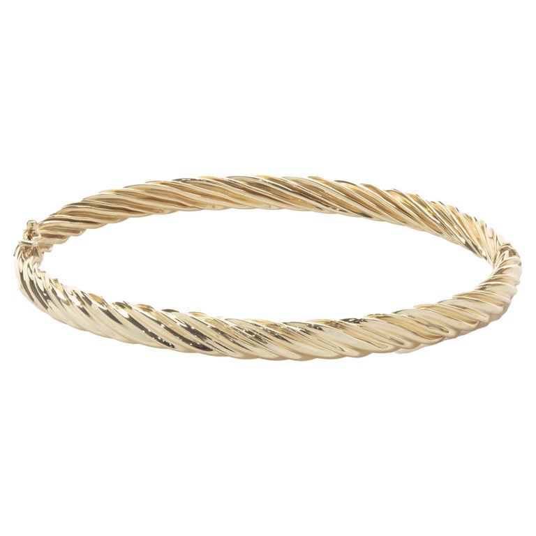 14 Karat Yellow Gold Twist Bangle Bracelet For Sale at 1stDibs