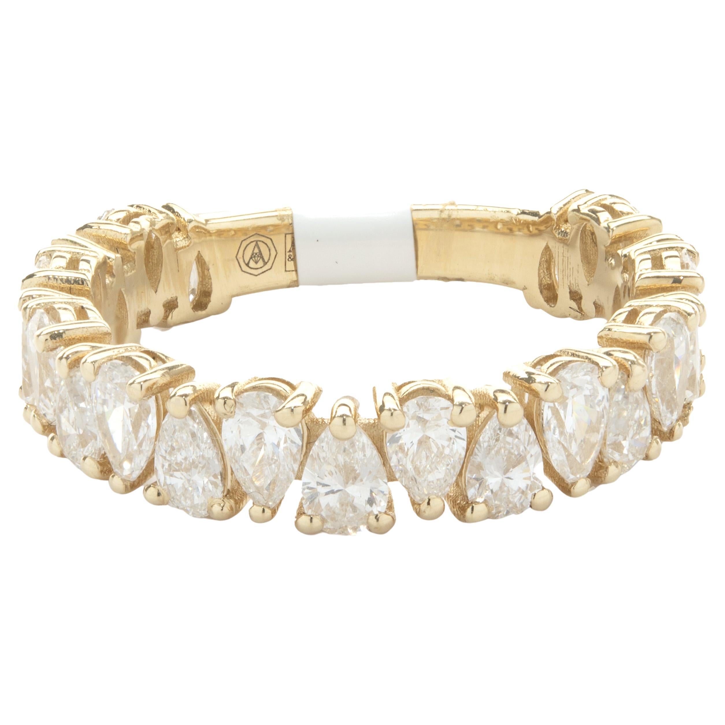 14 Karat Yellow Gold Pear Cut Diamond Tilt Band For Sale at 1stDibs