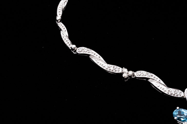 14k Striking Undulating Diamond and Blue Topaz Cluster Fringed Necklace ...