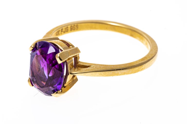 14k Yellow Gold Oval Mixed Cut Purple Amethyst Ring For Sale at 1stDibs
