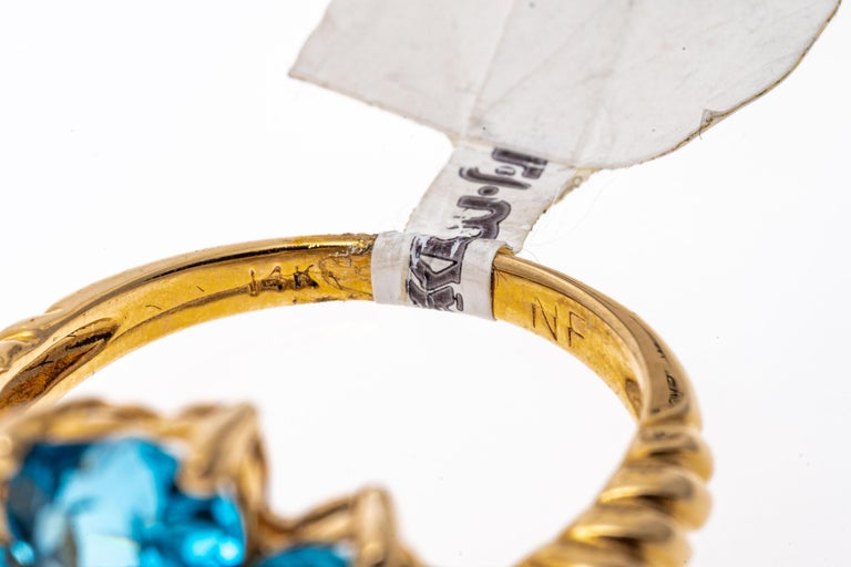 14k Yellow Gold Swiss Blue Topaz Flower Form Ring For Sale at 1stDibs