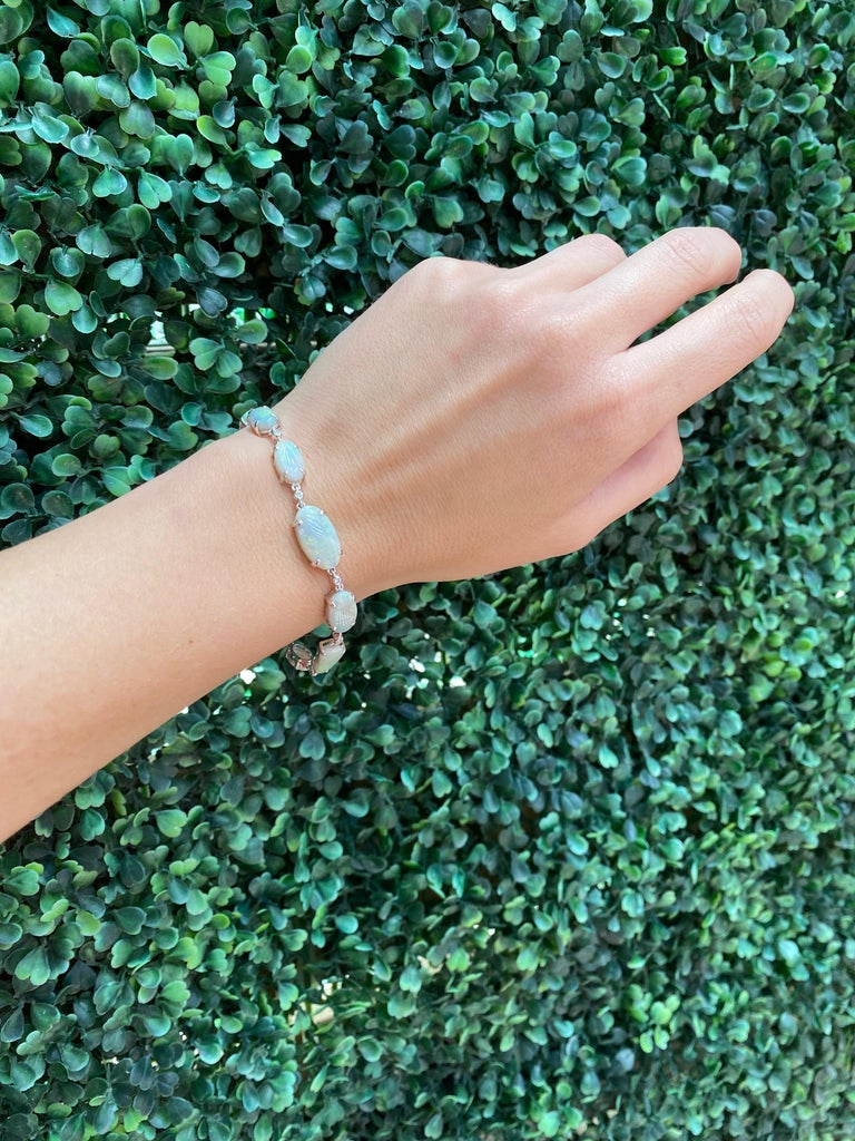 15.70 Carat Total Weight Oval Shaped Lightning Ridge Opals 18k Gold ...