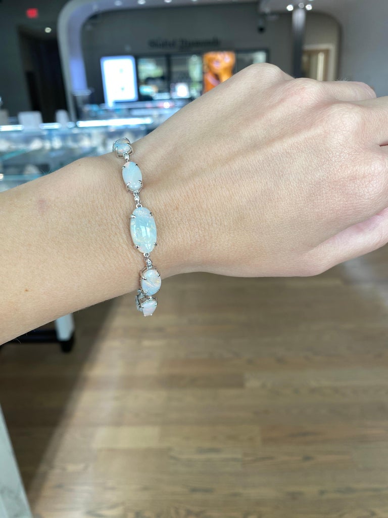 15.70 Carat Total Weight Oval Shaped Lightning Ridge Opals 18k Gold ...