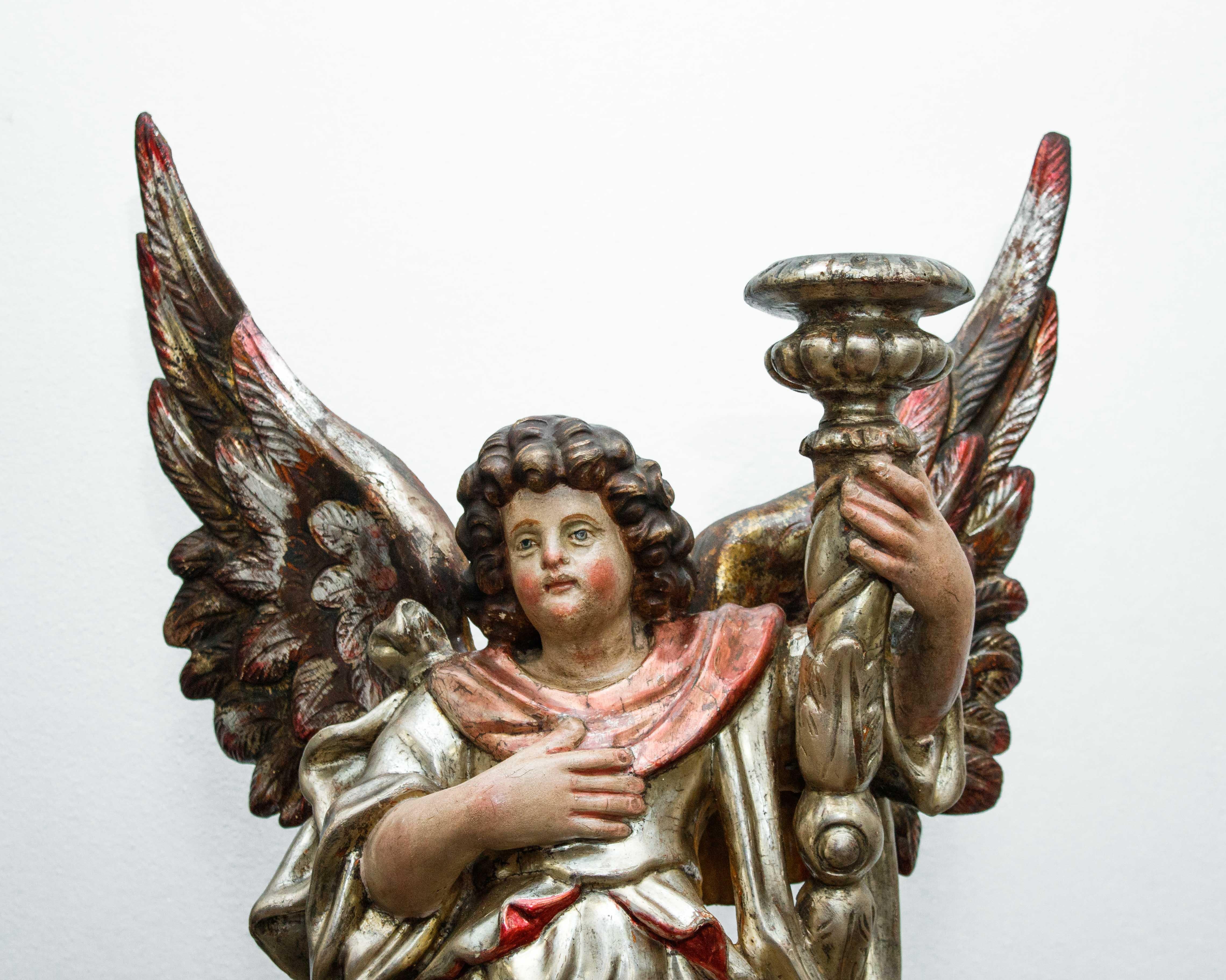 17th Century Candle-holding angels in mecca gilded wood For Sale at 1stDibs