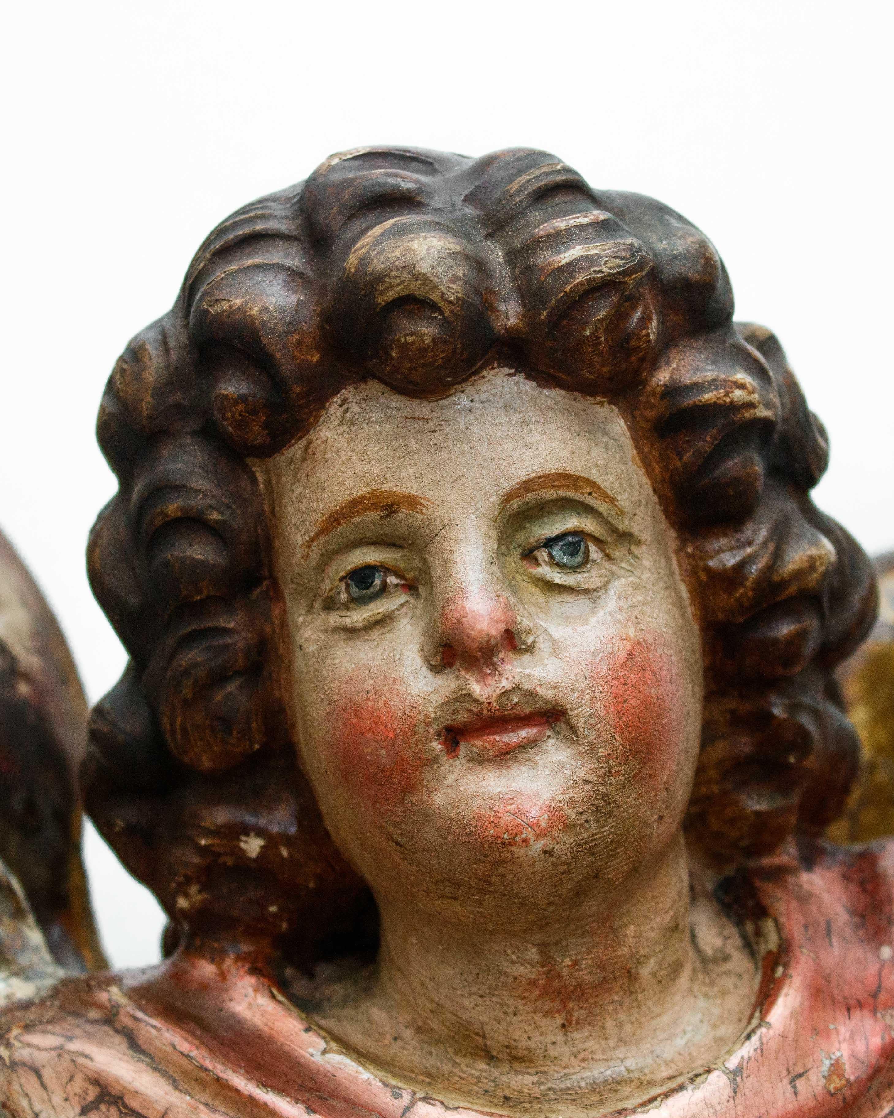 17th Century Candle-holding angels in mecca gilded wood For Sale at 1stDibs