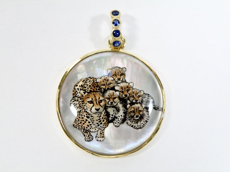 18 Karat and Sapphire Reverse Crystal Carving For Sale at 1stDibs