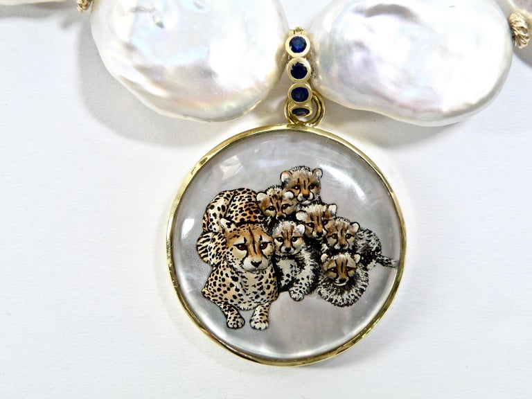 18 Karat and Sapphire Reverse Crystal Carving For Sale at 1stDibs