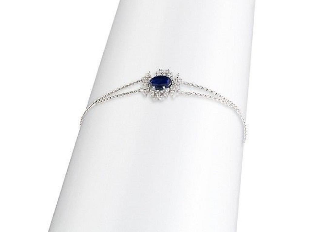 18 Karat Bestow White Gold Bracelet Bangle With Vs Gh Diamonds And Blue