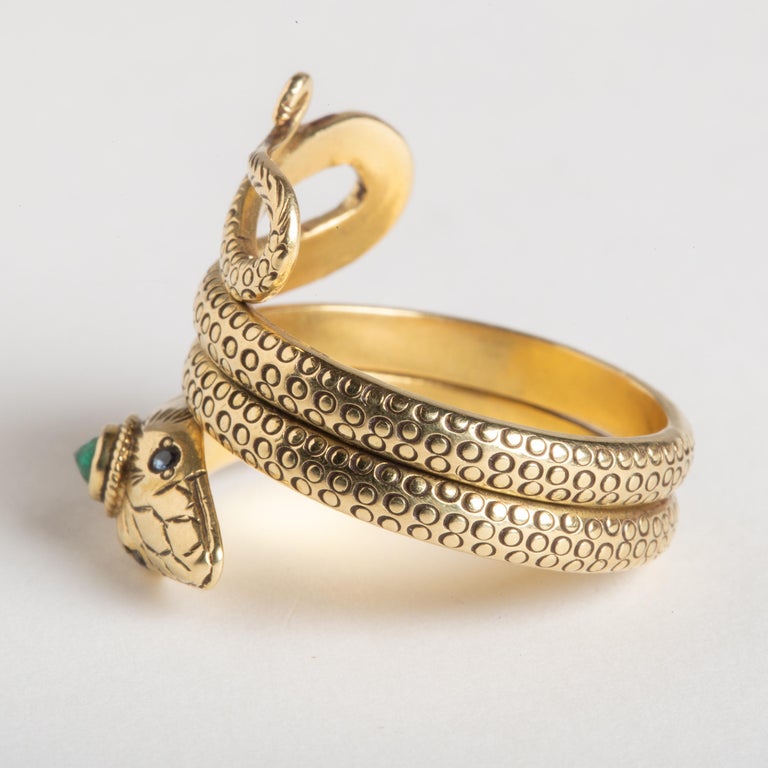 18 Karat Gold Coiled Snake Ring with Emerald and Sapphires at 1stDibs