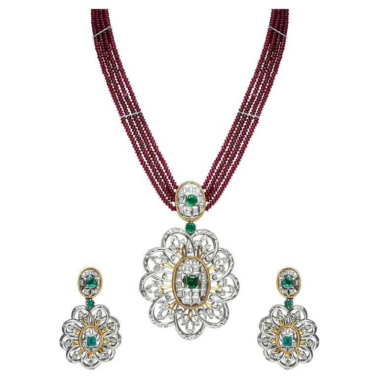 18 Karat Gold Ruby Set with Diamonds and Emeralds For Sale at 1stDibs