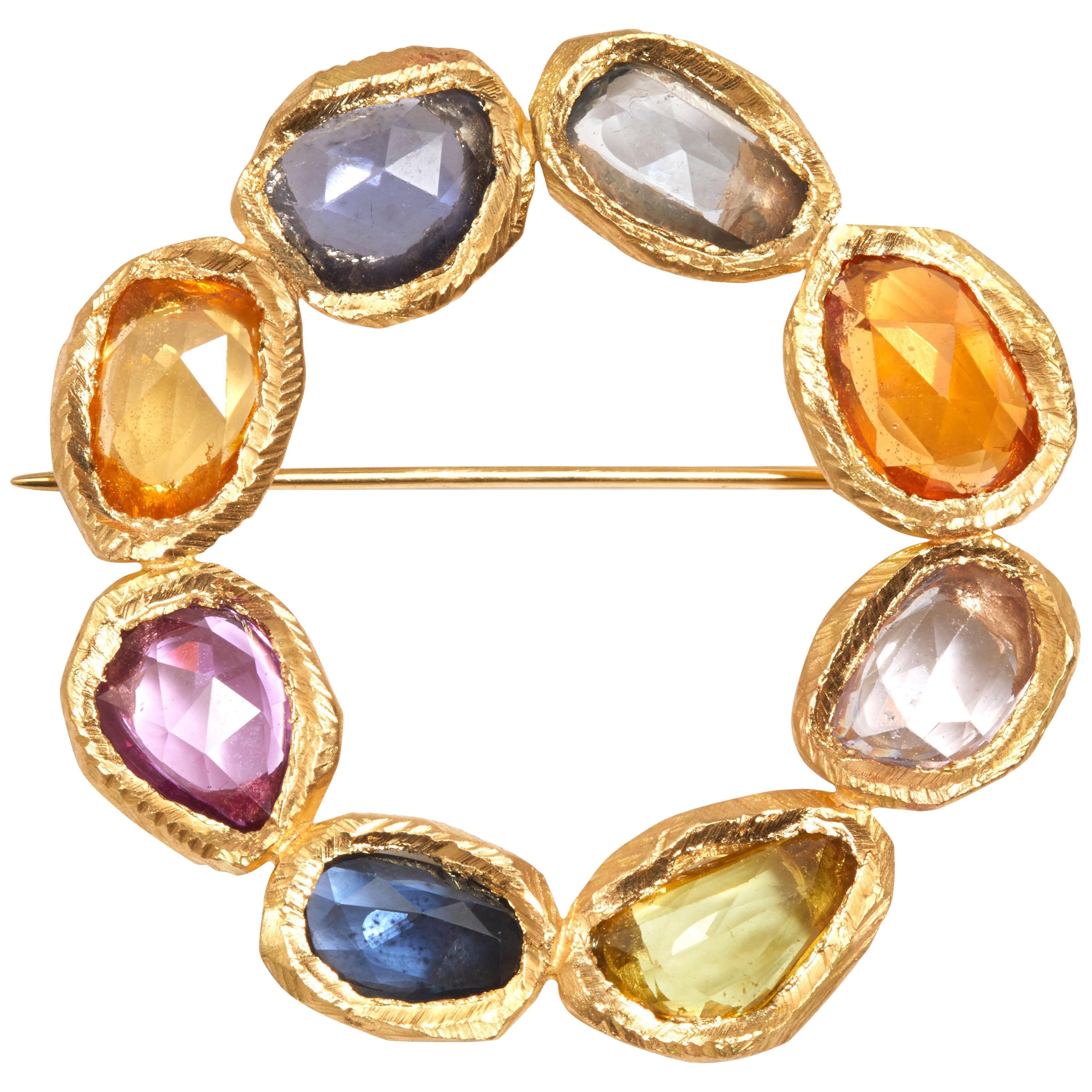 18 Karat Gold Sapphire Circle Pin or Brooch at 1stDibs