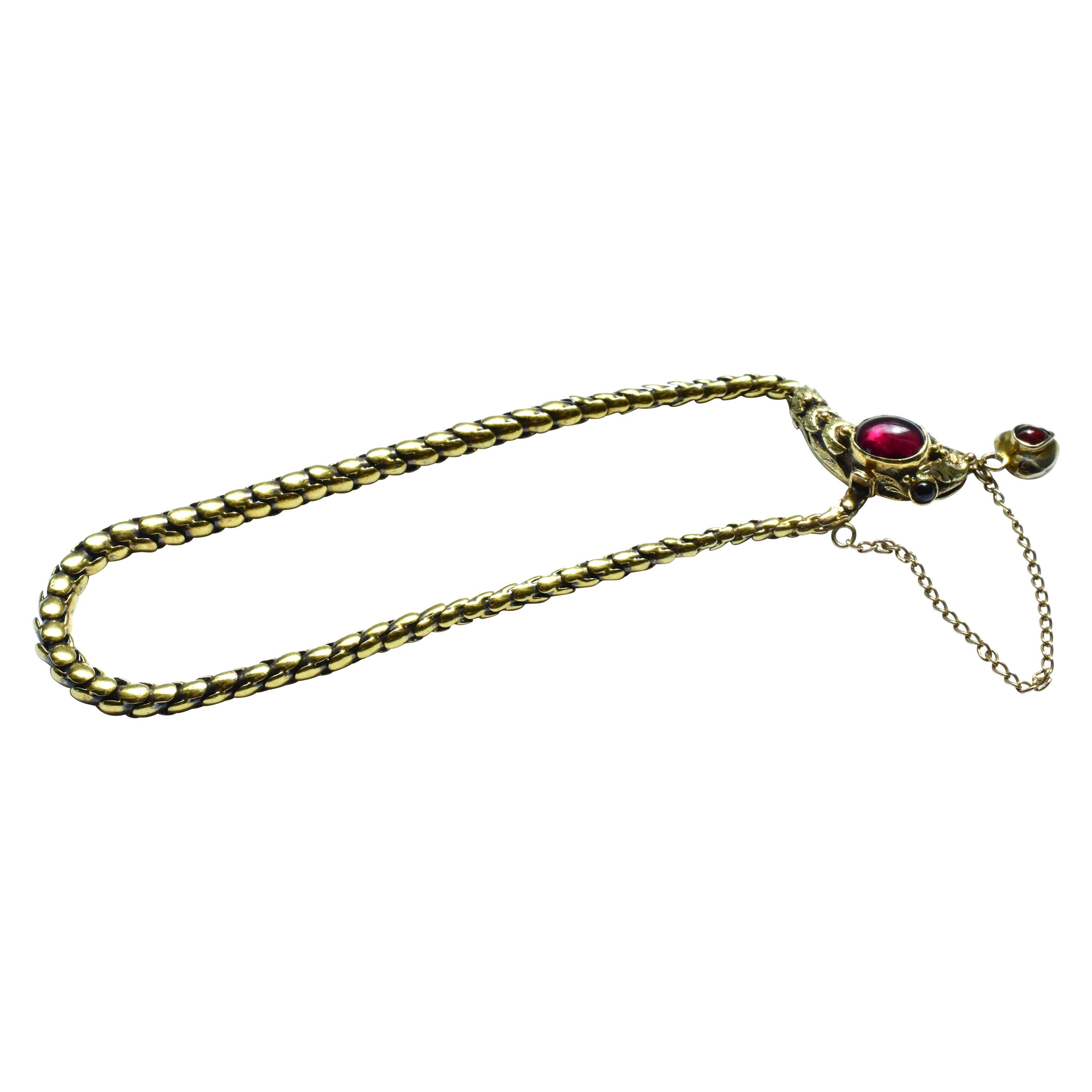 18 Karat Snake Bracelet with Garnet Head, circa 1860 at 1stDibs