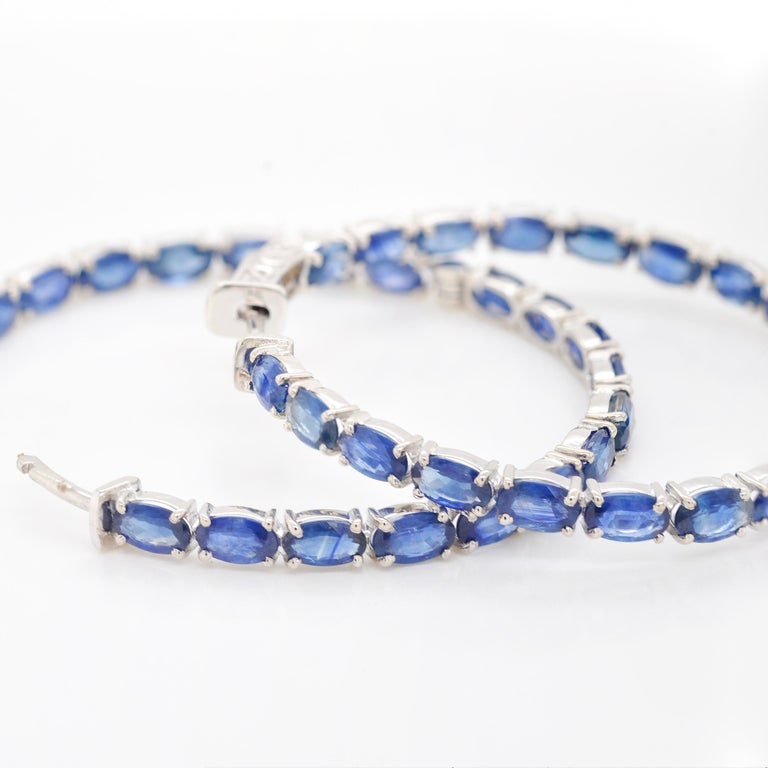 18 Karat White Gold Oval Blue Sapphire Hoop Earrings For Sale at 1stDibs
