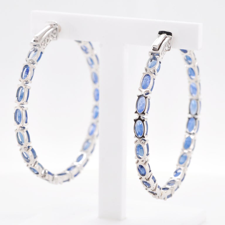 18 Karat White Gold Oval Blue Sapphire Hoop Earrings For Sale at 1stDibs